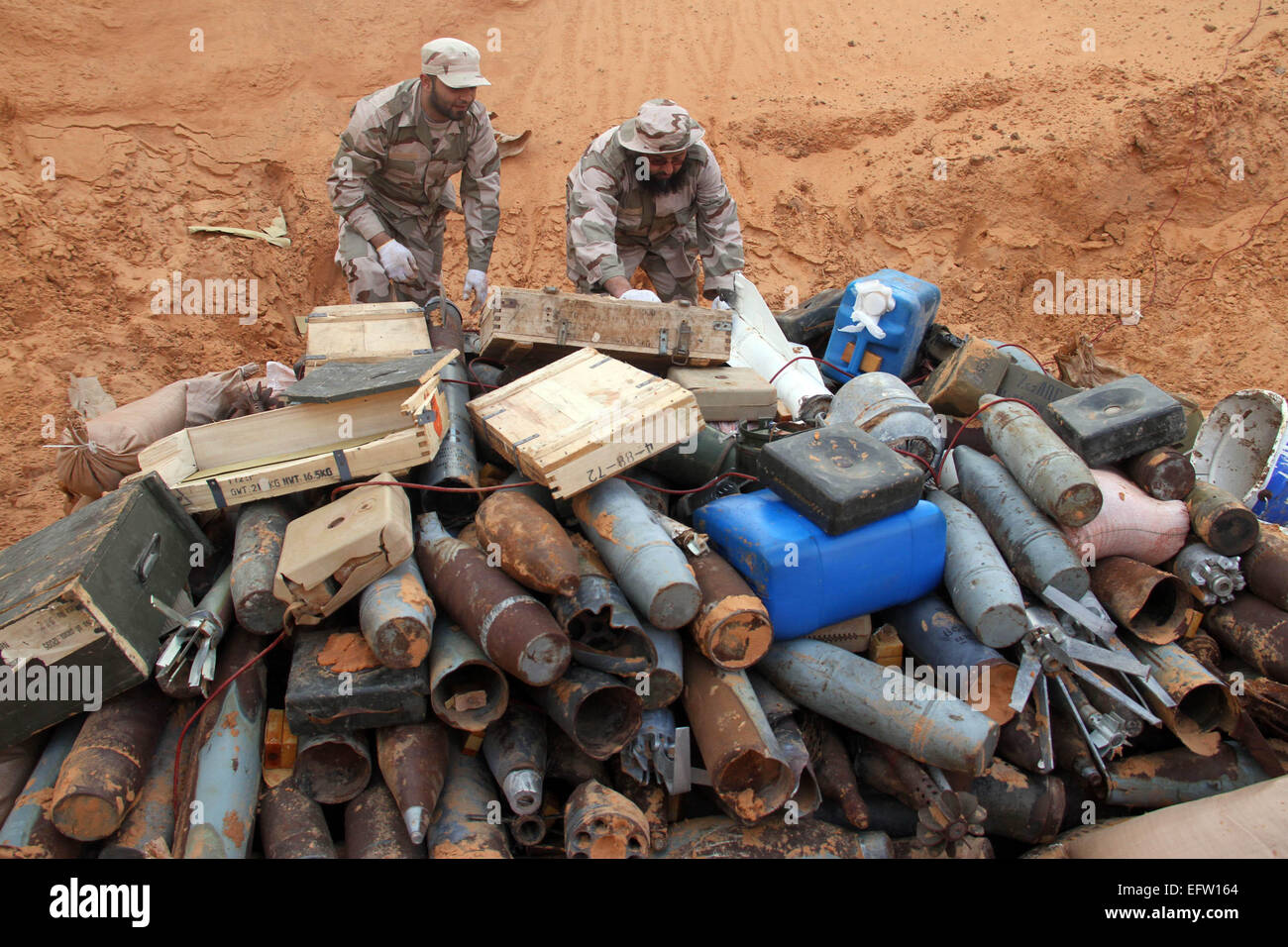Tripoli, Libya. 10th Feb, 2015. Some sappers pile the unexploded shells ...