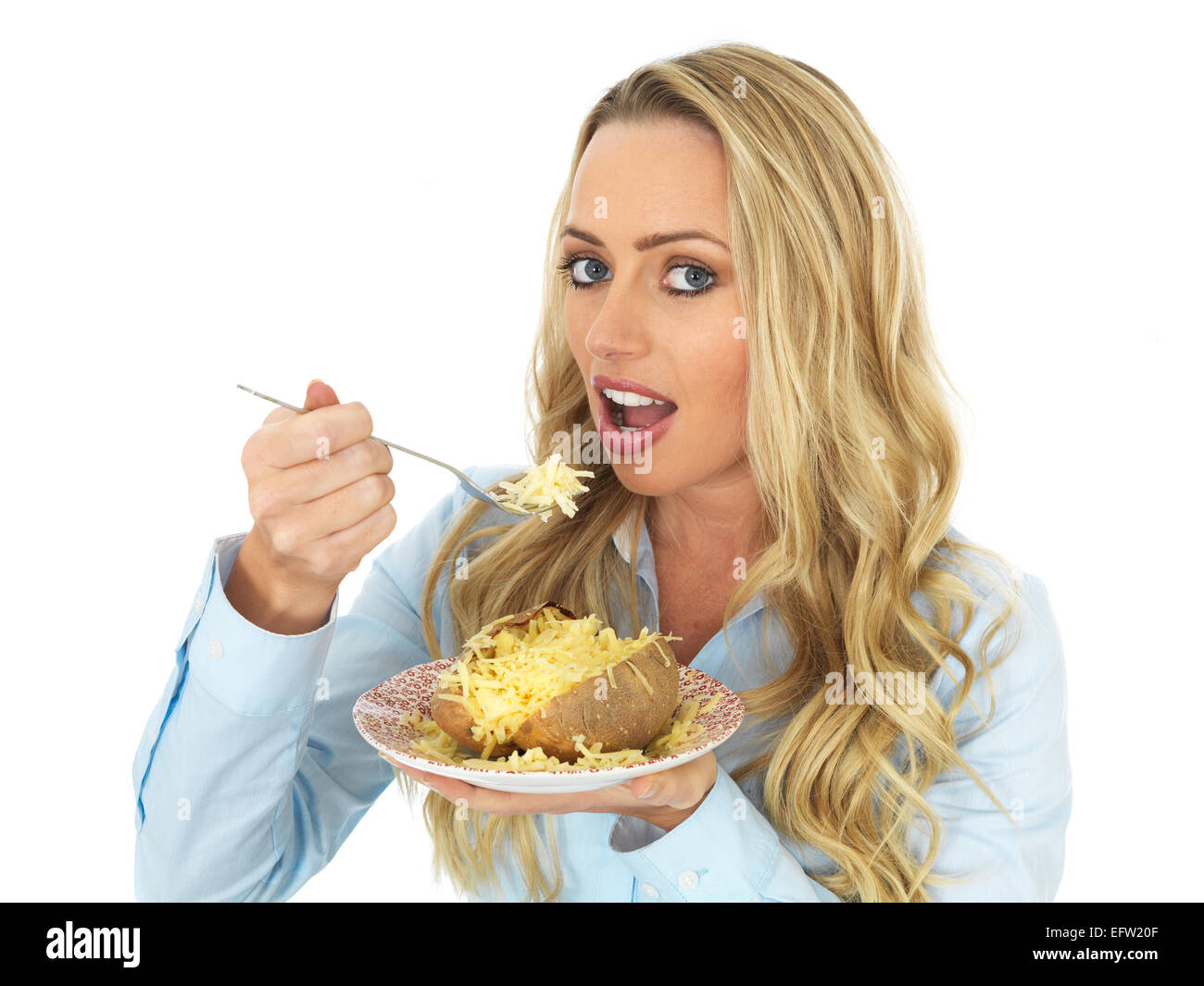 Happy Young Woman Eating A Freshly Baked Jacket Potato Filled With ...