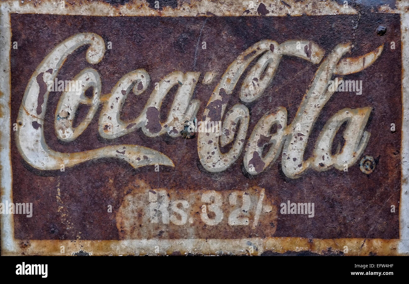 An old rusted Coca Cola signboard in Nepal Stock Photo - Alamy