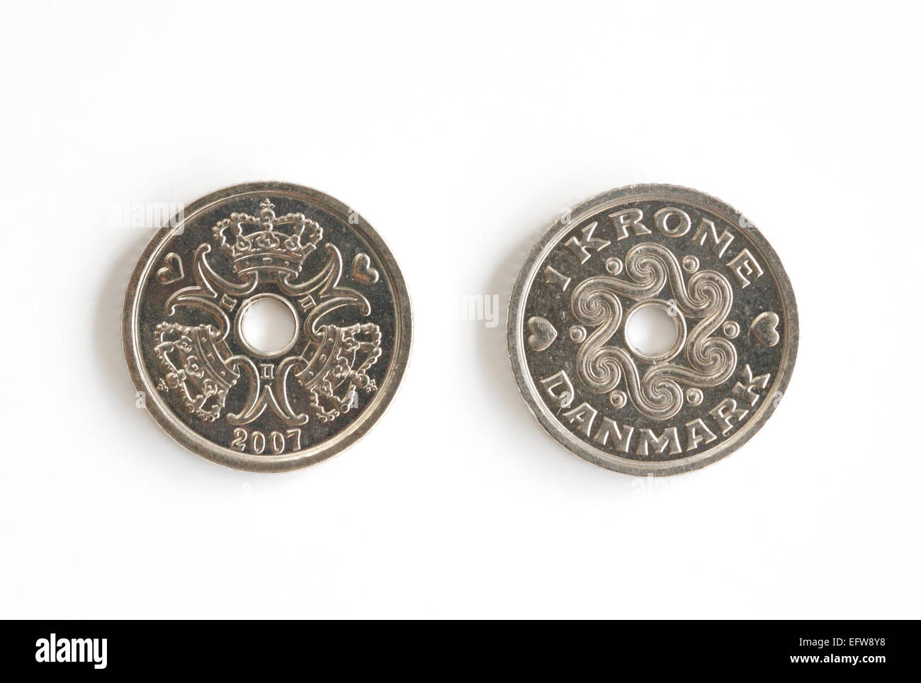 Two Danish one Kroner pieces on a white background Stock Photo - Alamy
