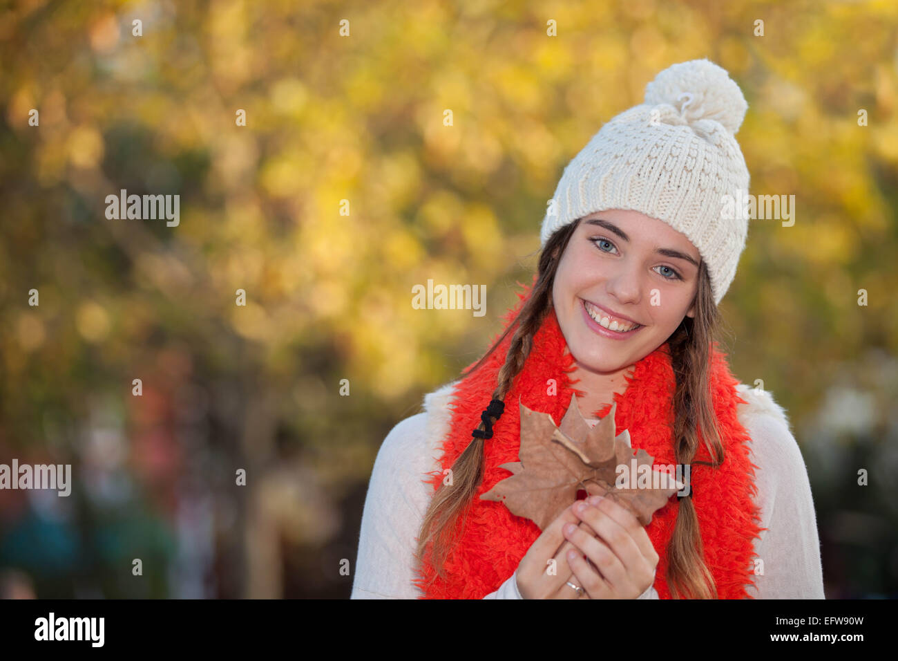 smiling happy girl warm woolly Stock Photo - Alamy