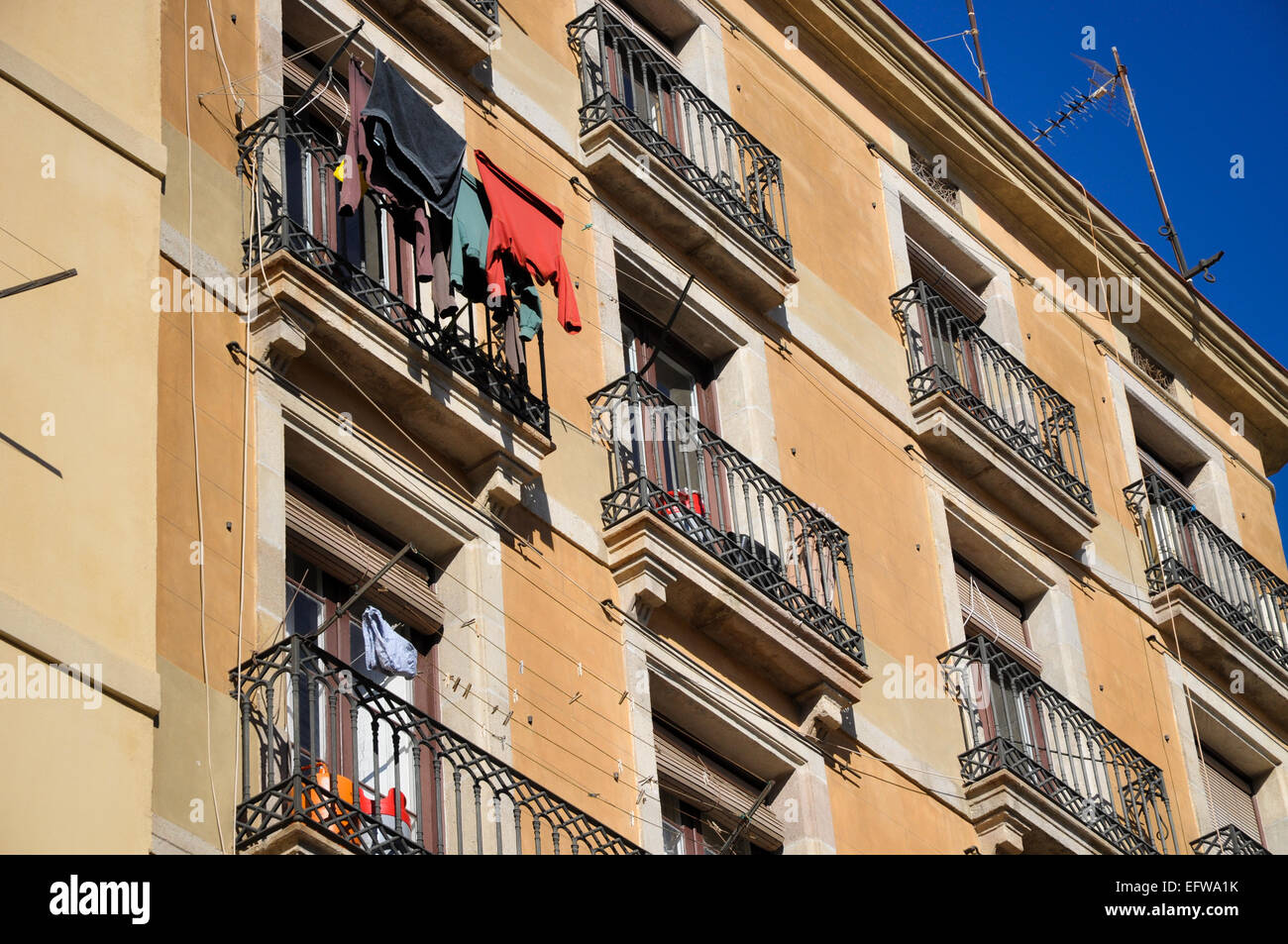 Barcelona Spain apartment building with laundry Stock Photo - Alamy