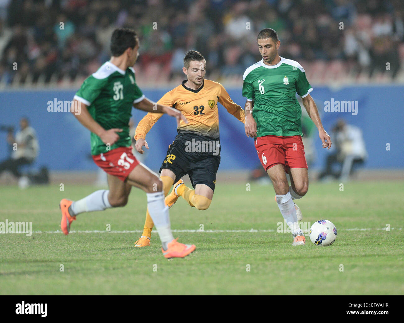 Kuwait City, Kuwait. 10th Feb, 2015. Ivan Nagaev (C) of Kuwait's Qadsia ...