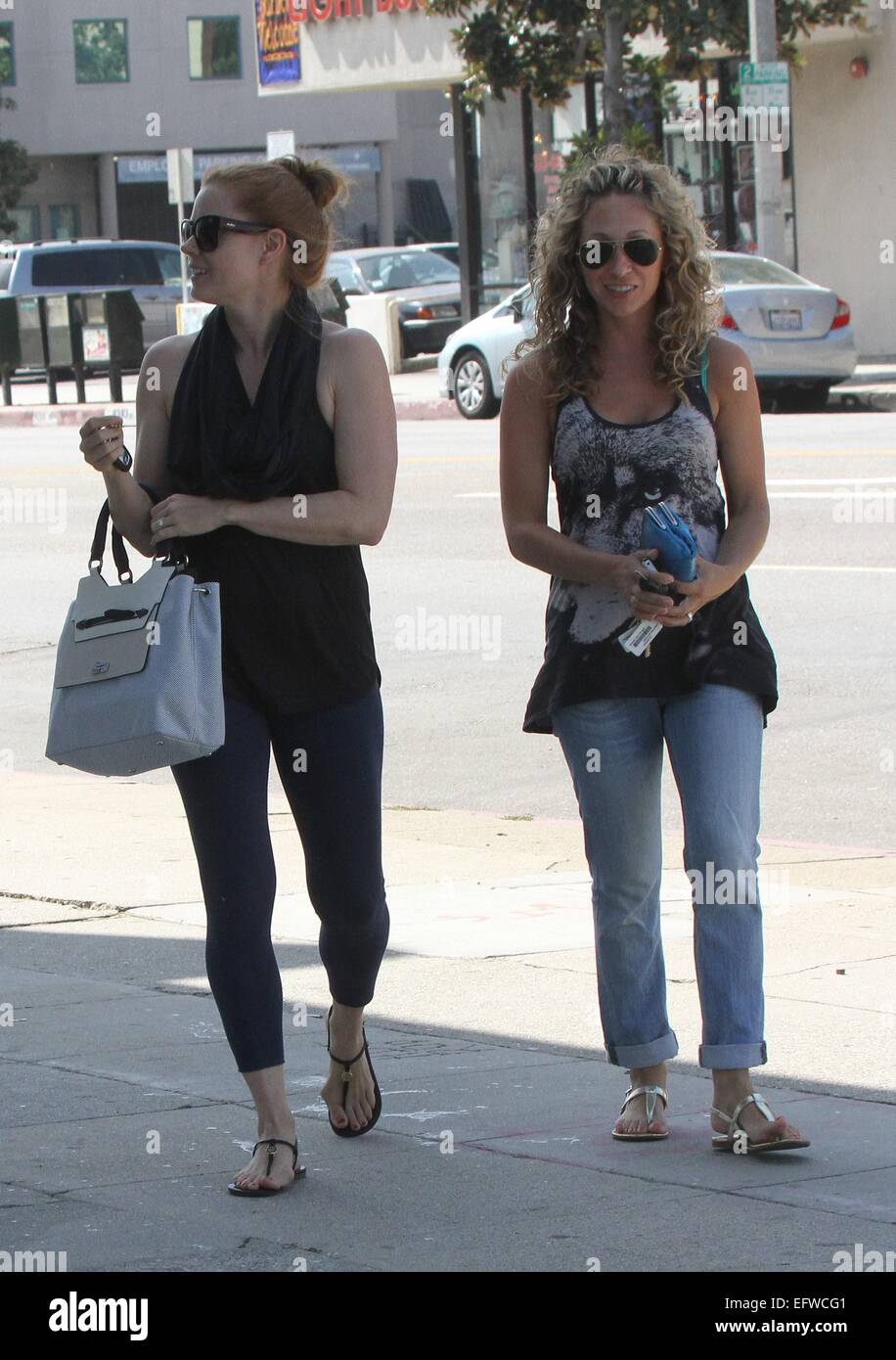 Amy Adams is all smiles during a walk on Beverly Boulevard with a ...