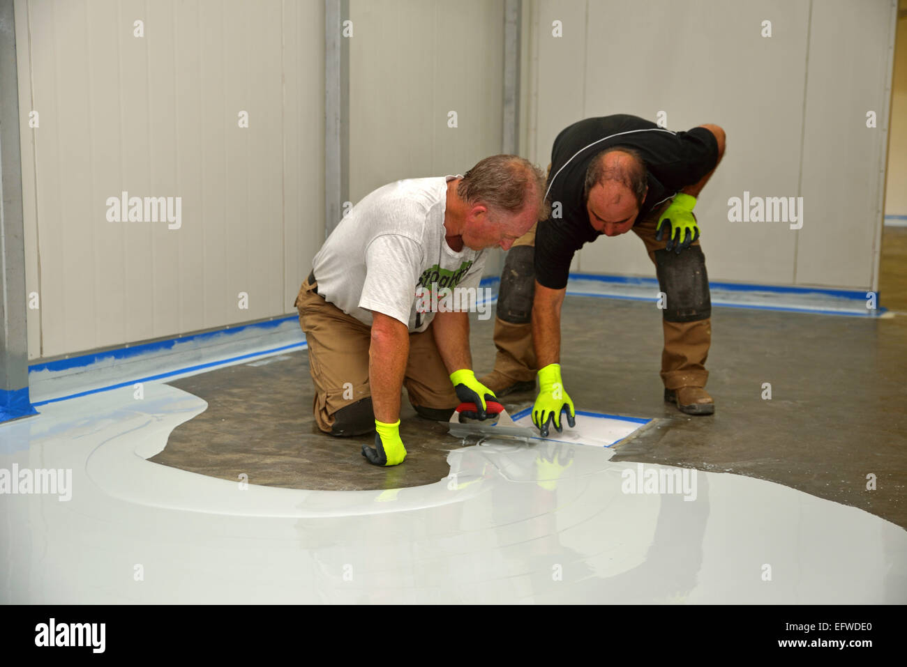 Two coatings hi-res stock photography and images - Alamy