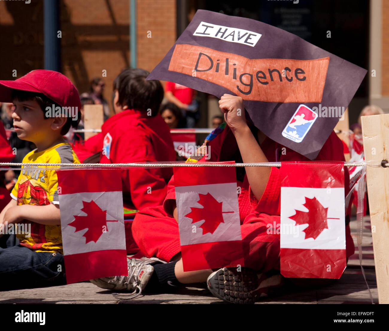 children holding signs up at the Victoria Day Parade 2010, Victoria ...