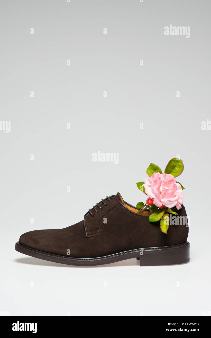 Pair of Men's Shoes with flower isolated on white background Stock ...