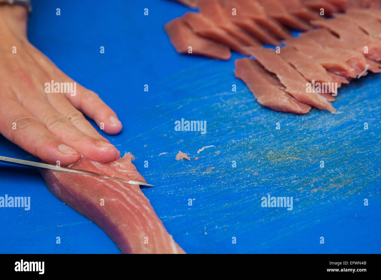 Cutting fish hi-res stock photography and images - Alamy