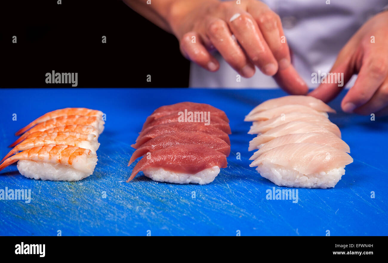 chef preparing Japanese sushi rolls Stock Photo - Alamy