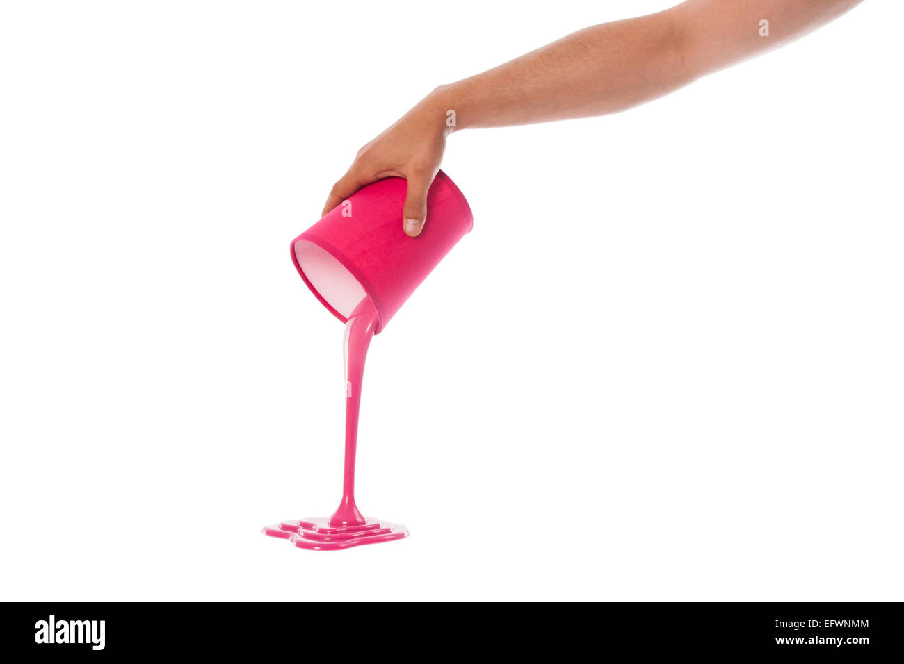 pouring paint from colored container on white background Stock Photo ...
