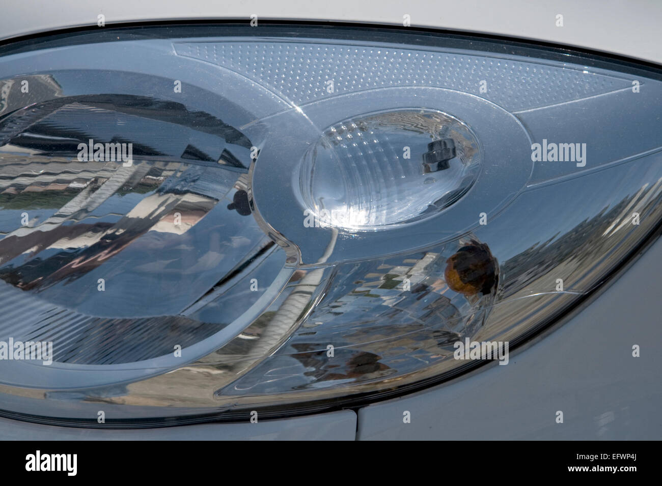 Different kind of reflections in a car headlight Stock Photo - Alamy