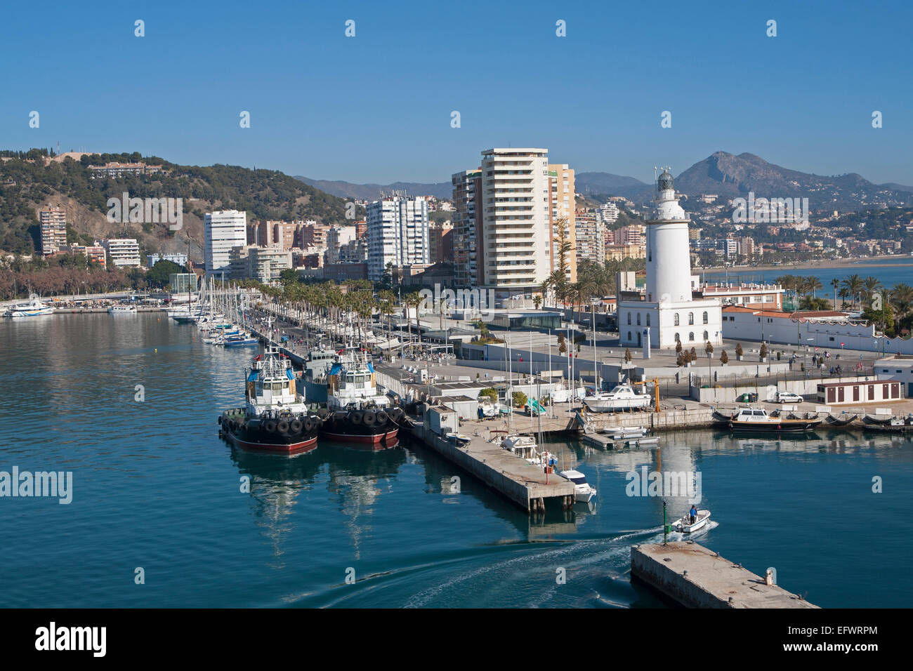 Apartment blocks and yachts in marina of Muelle Uno port development ...