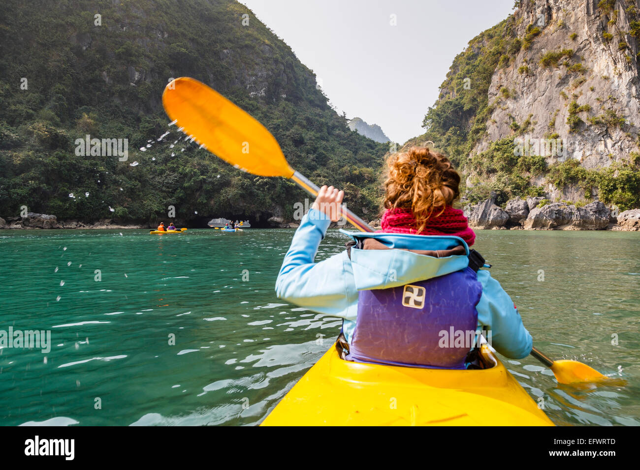 Woman kayaking at Halong Bay, Vietnam Stock Photo - Alamy
