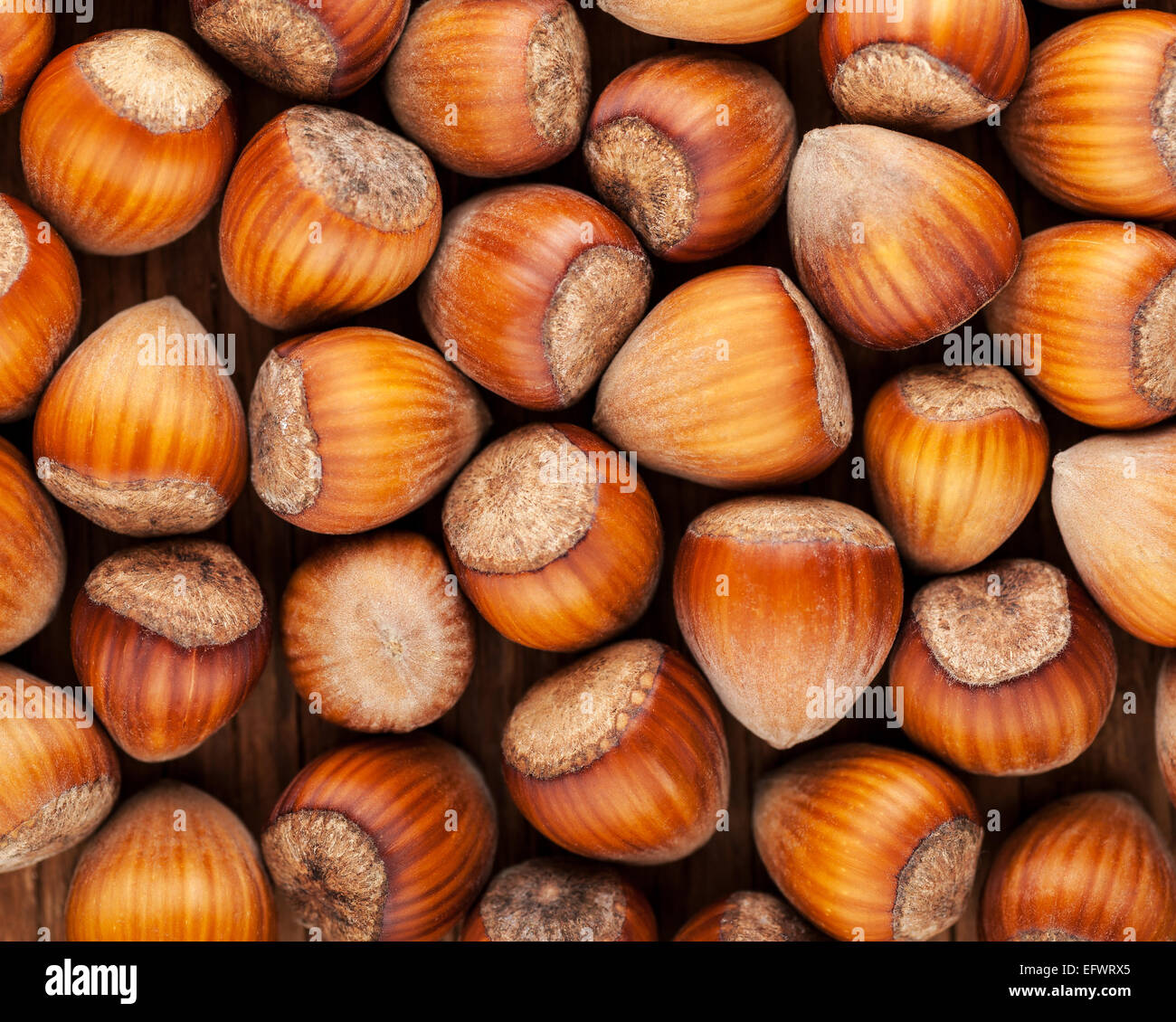 background of dried whole hazel nuts close-up Stock Photo - Alamy