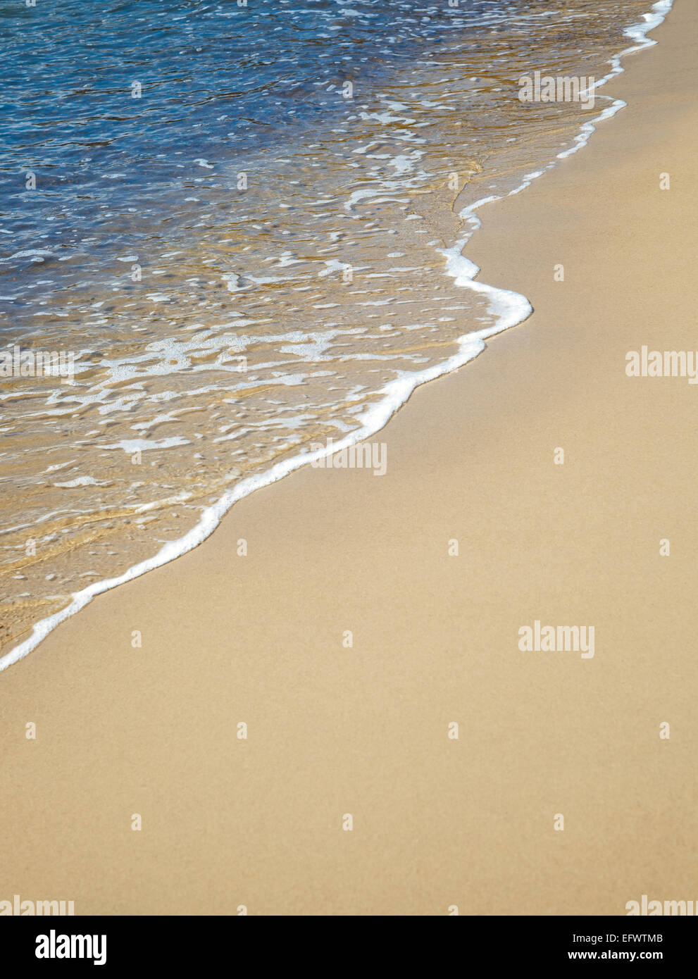 sand beach and calm water Stock Photo - Alamy