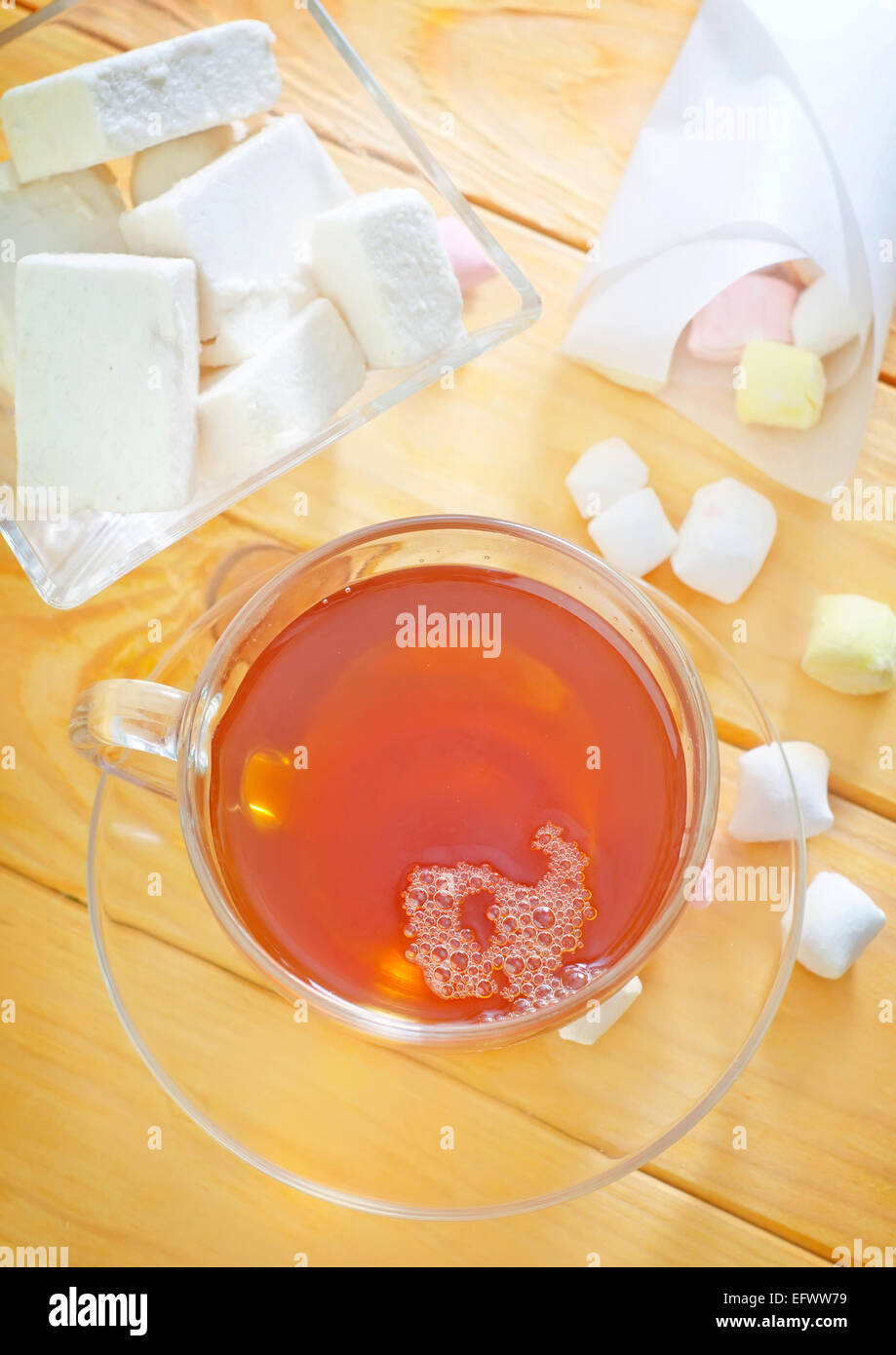 Fresh tea with candy Stock Photo - Alamy