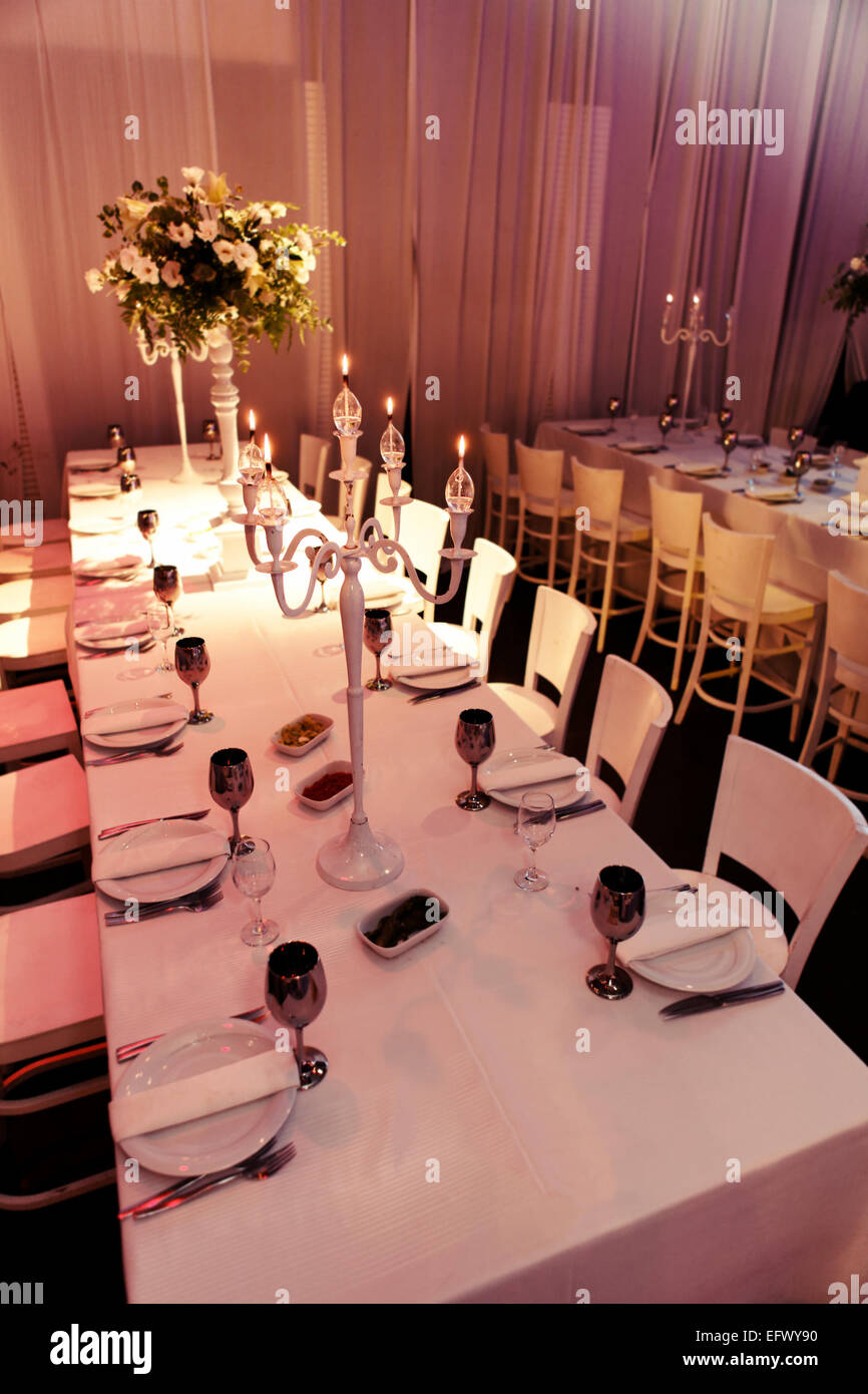 banquet table laid for a large number of people Stock Photo - Alamy