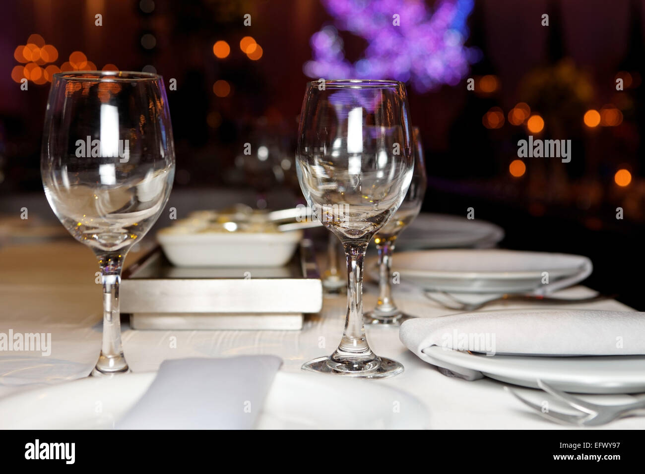 bright banquet table laid for a festive evening Stock Photo - Alamy