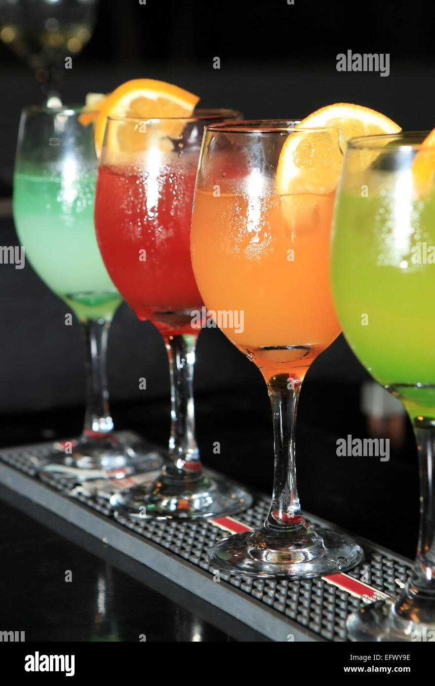 romantic cocktails standing on a bar rack Stock Photo - Alamy