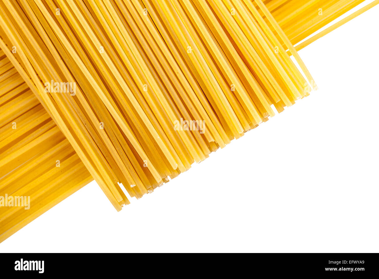 pasta lined up in a row on a white background Stock Photo - Alamy