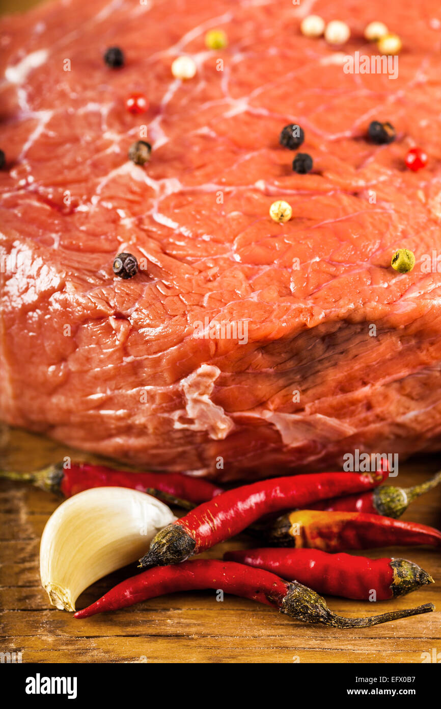 raw fillet of beef with spices closeup Stock Photo - Alamy