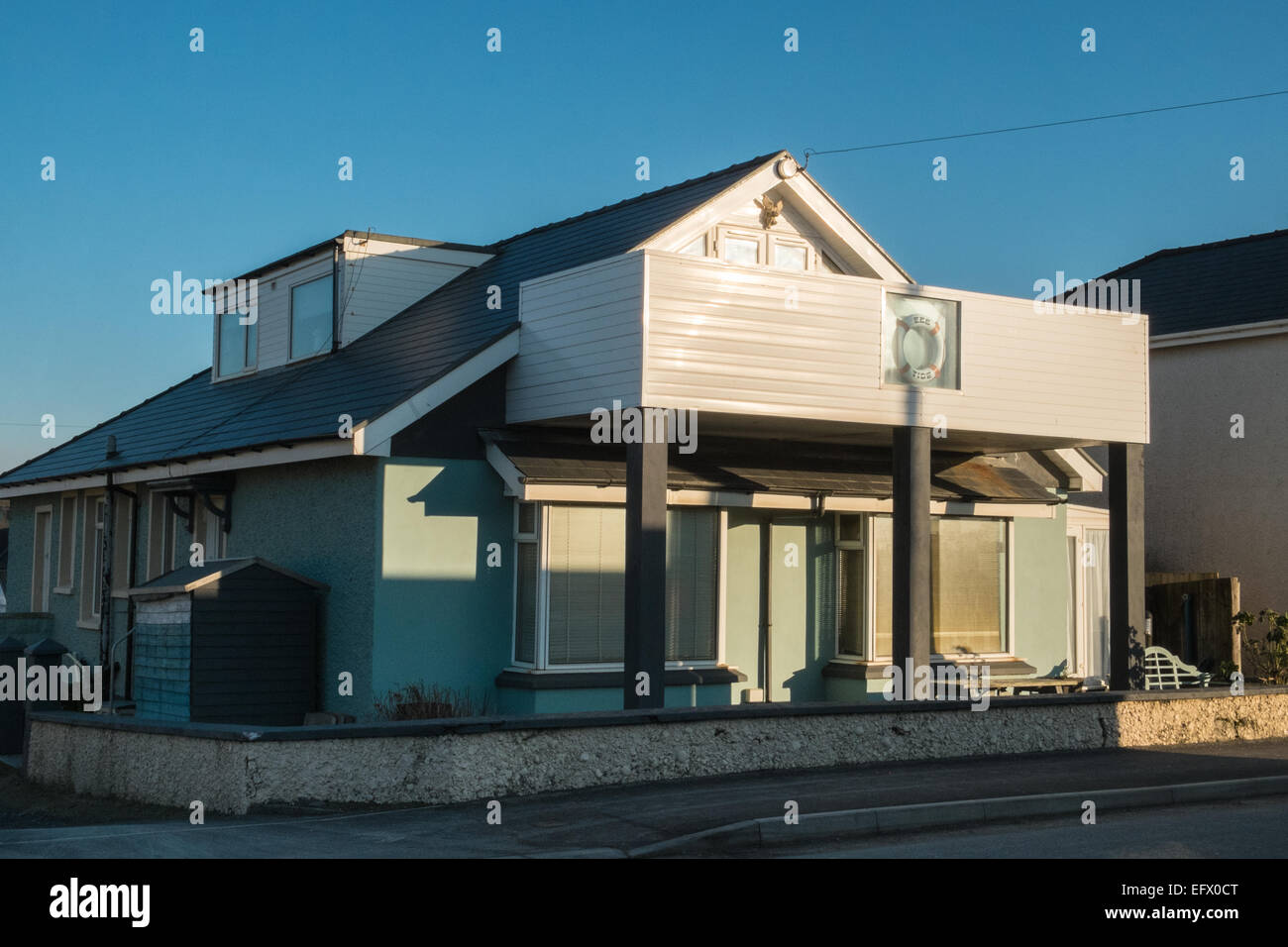 Pastel colour house and huge balcony on seafront at Borth, resort ...