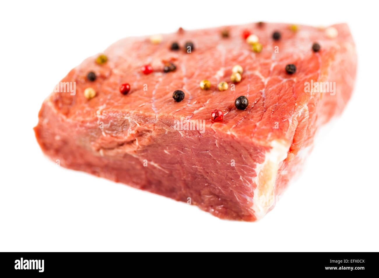 raw beef filet with spices isolated on a white background Stock Photo ...