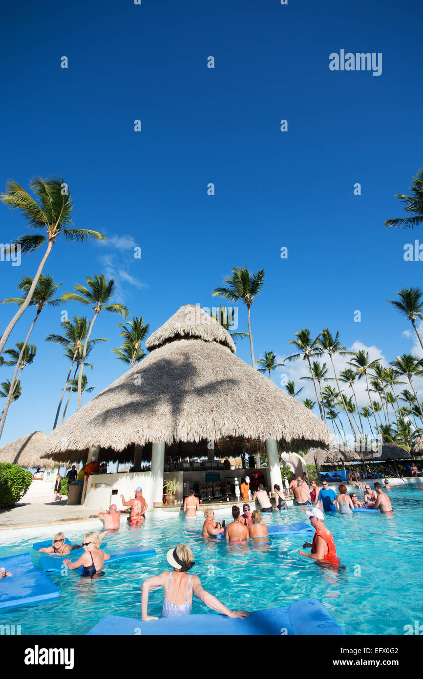 DOMINICAN REPUBLIC. A hotel swimming pool with a swim-up bar. 2015 ...