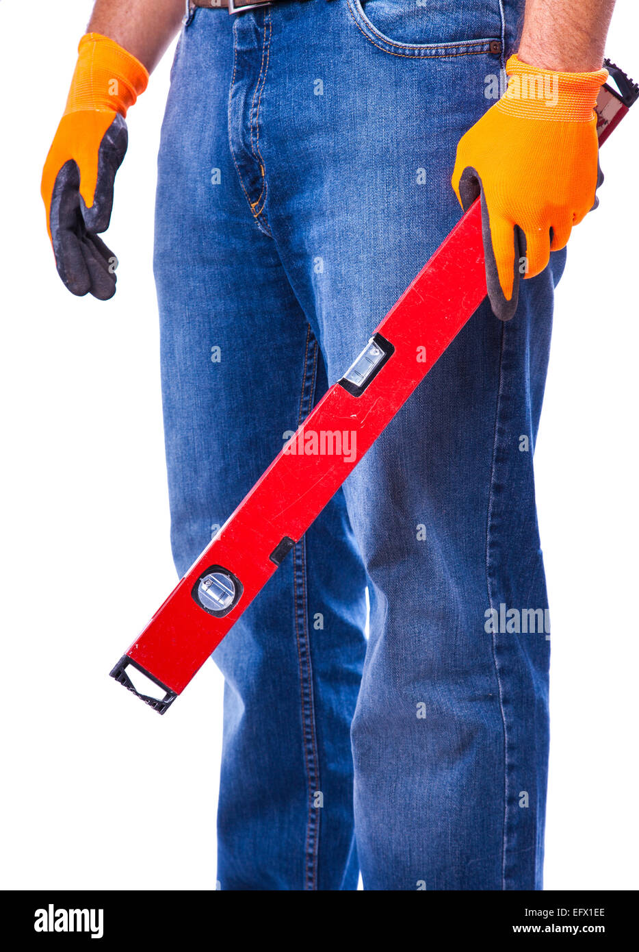 man holding a tool in the hands of the level Stock Photo - Alamy