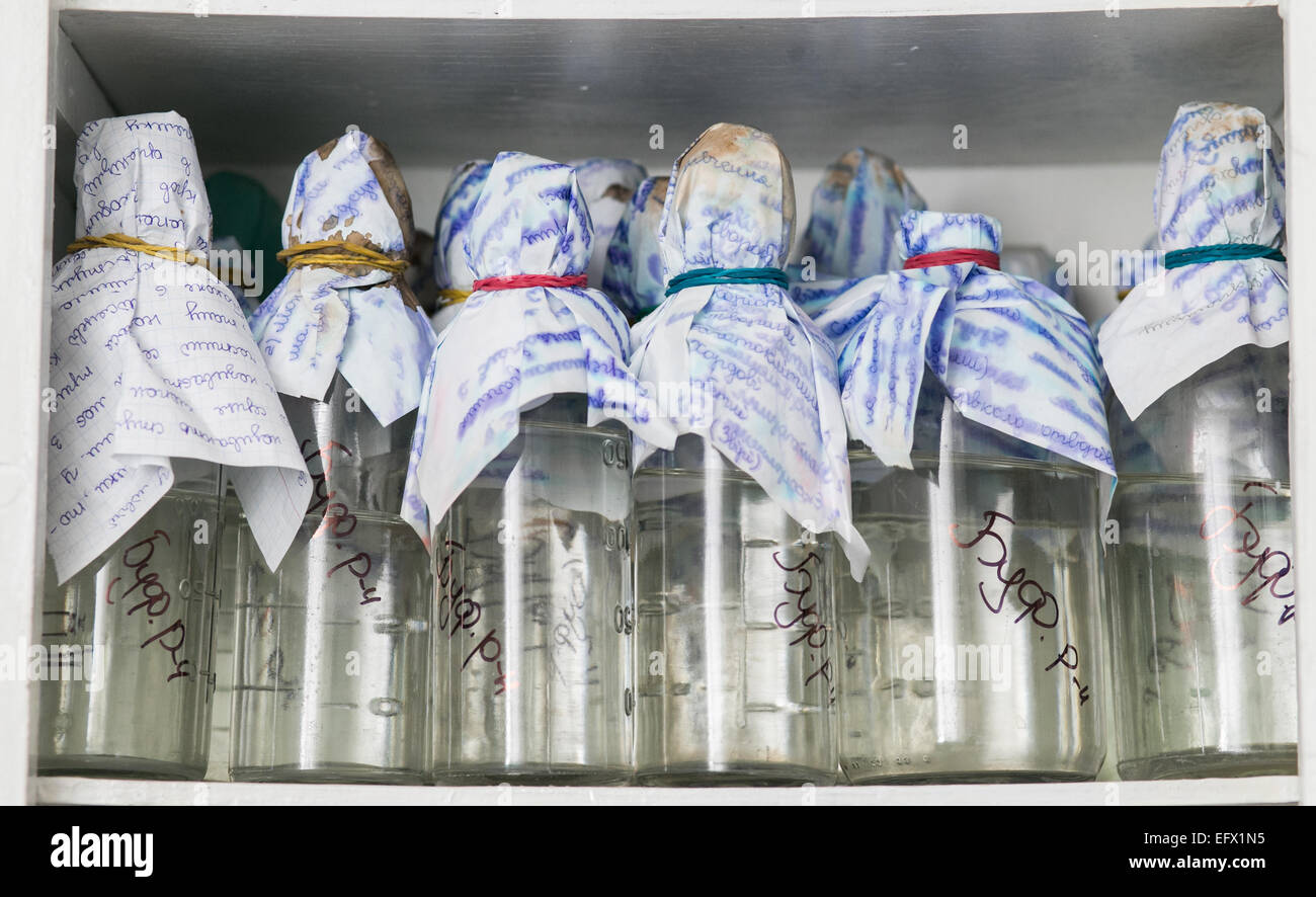 Bottles with transparent solution in laboratory Stock Photo - Alamy