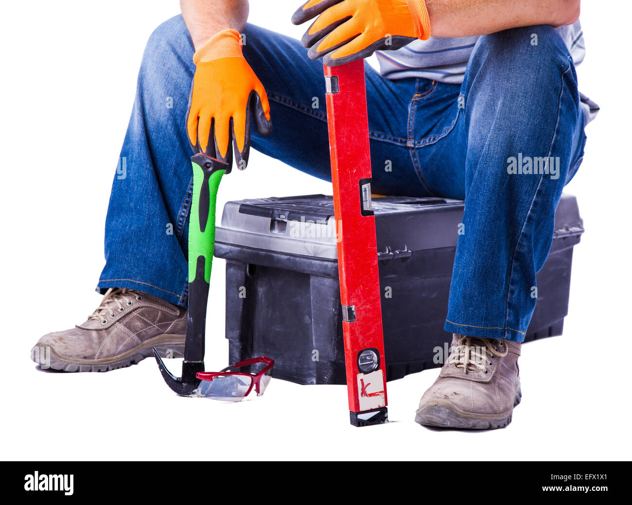 worker sitting on toolbox isolated white background Stock Photo - Alamy