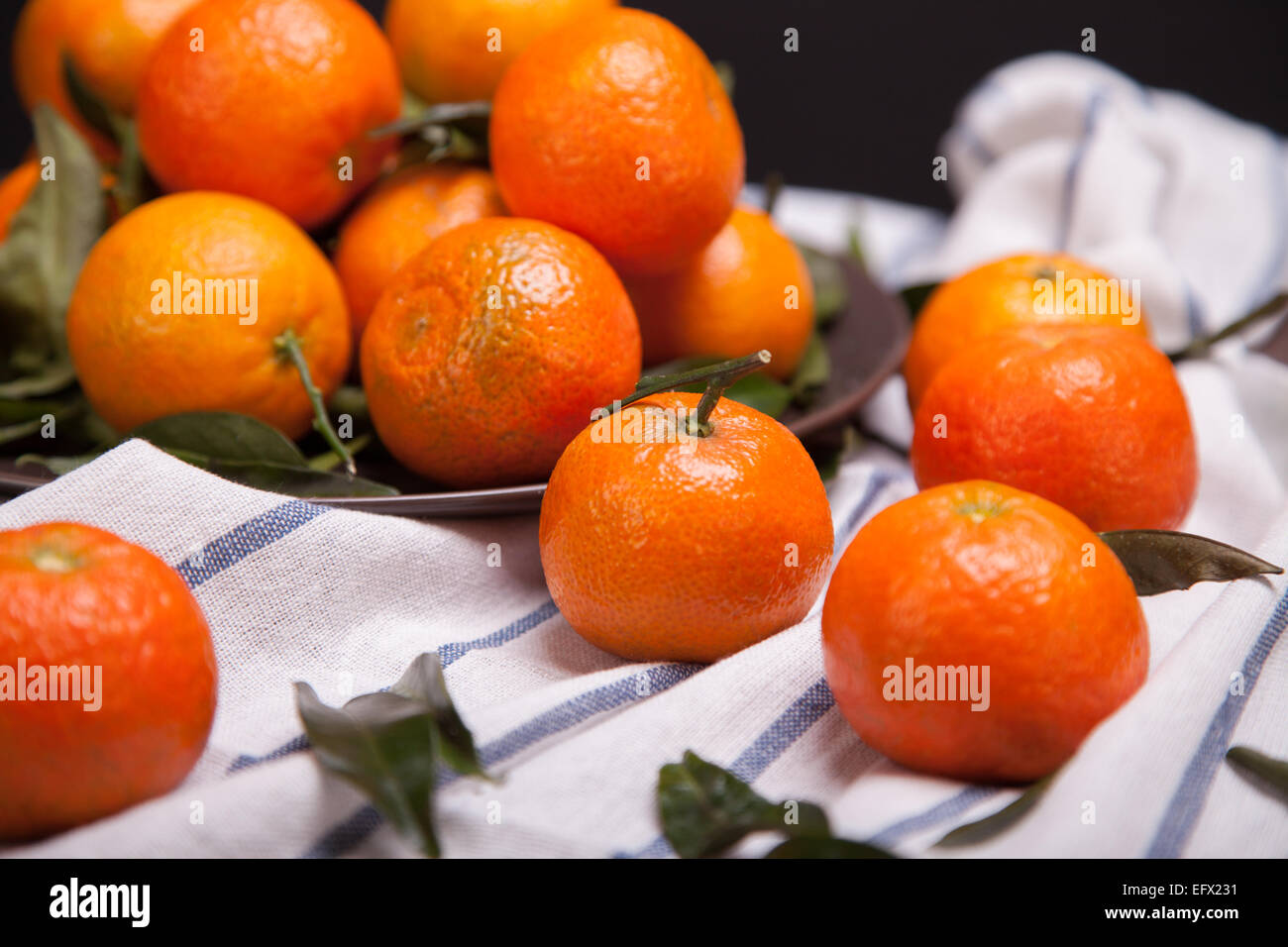 bunch of tangerines Stock Photo - Alamy