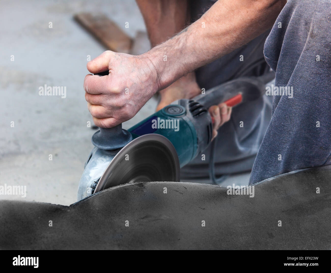 Working with stone grinder, work background Stock Photo - Alamy