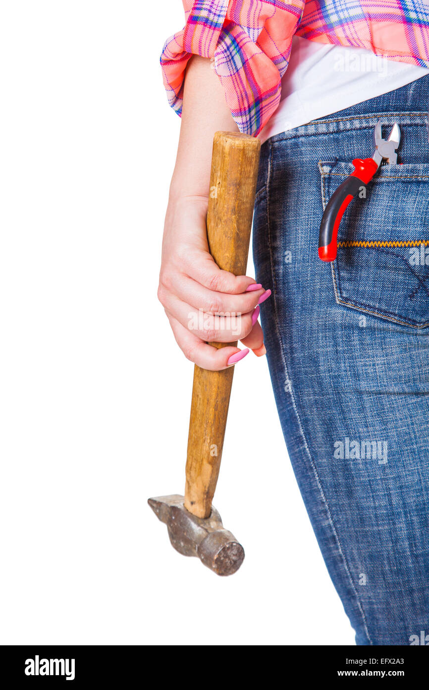 worker stands with his back with hammer in hand Stock Photo - Alamy
