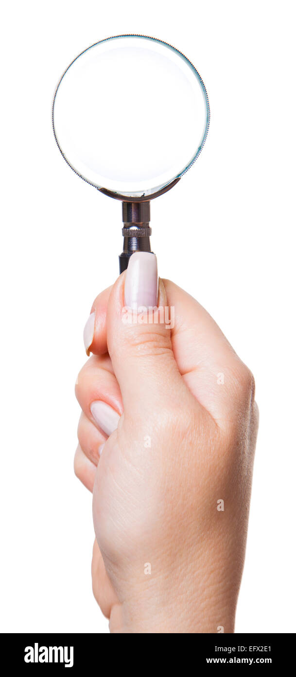 Magnifier in a female hand, isolated white background Stock Photo - Alamy