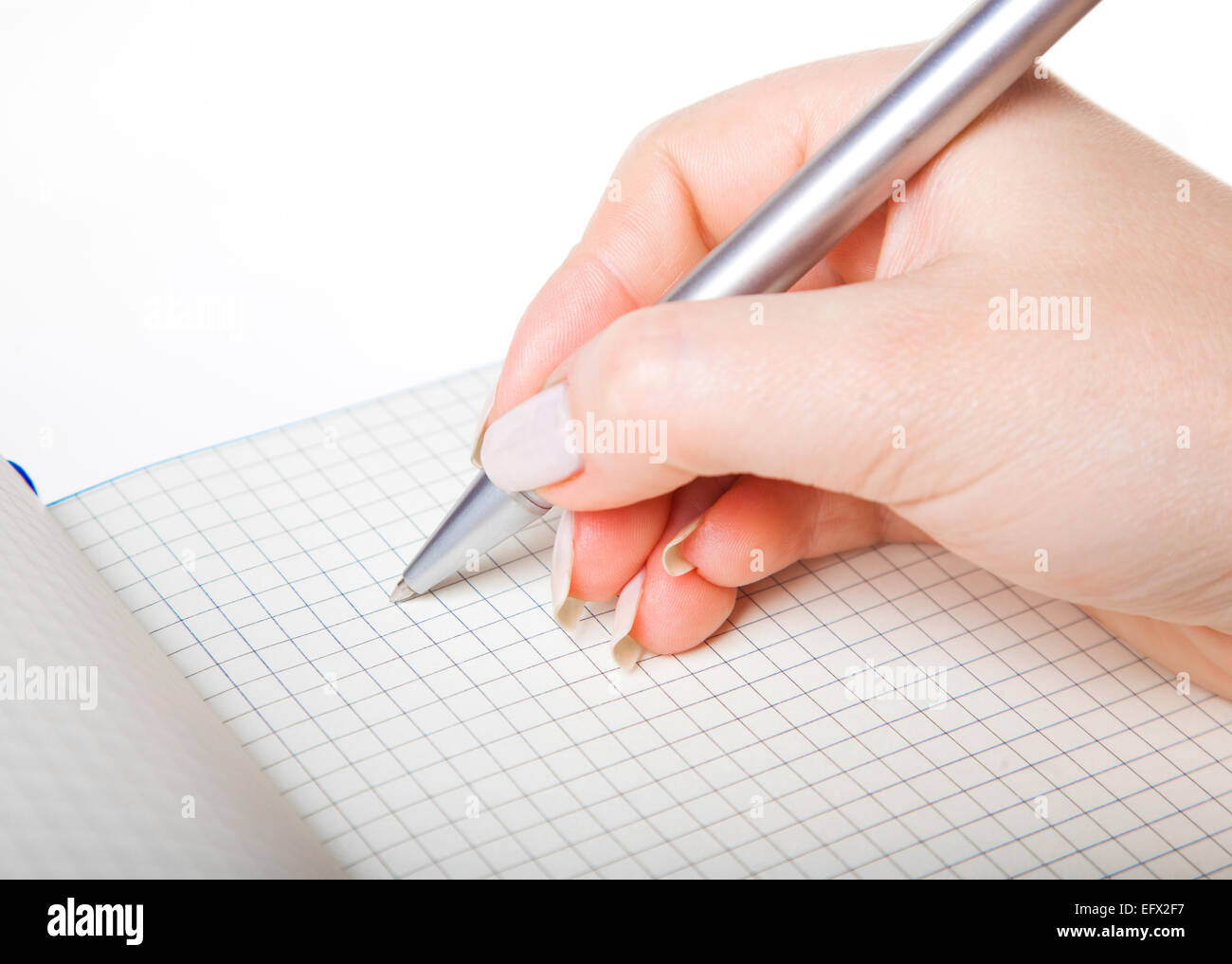 hand writing in a notebook isolated on white background Stock Photo - Alamy