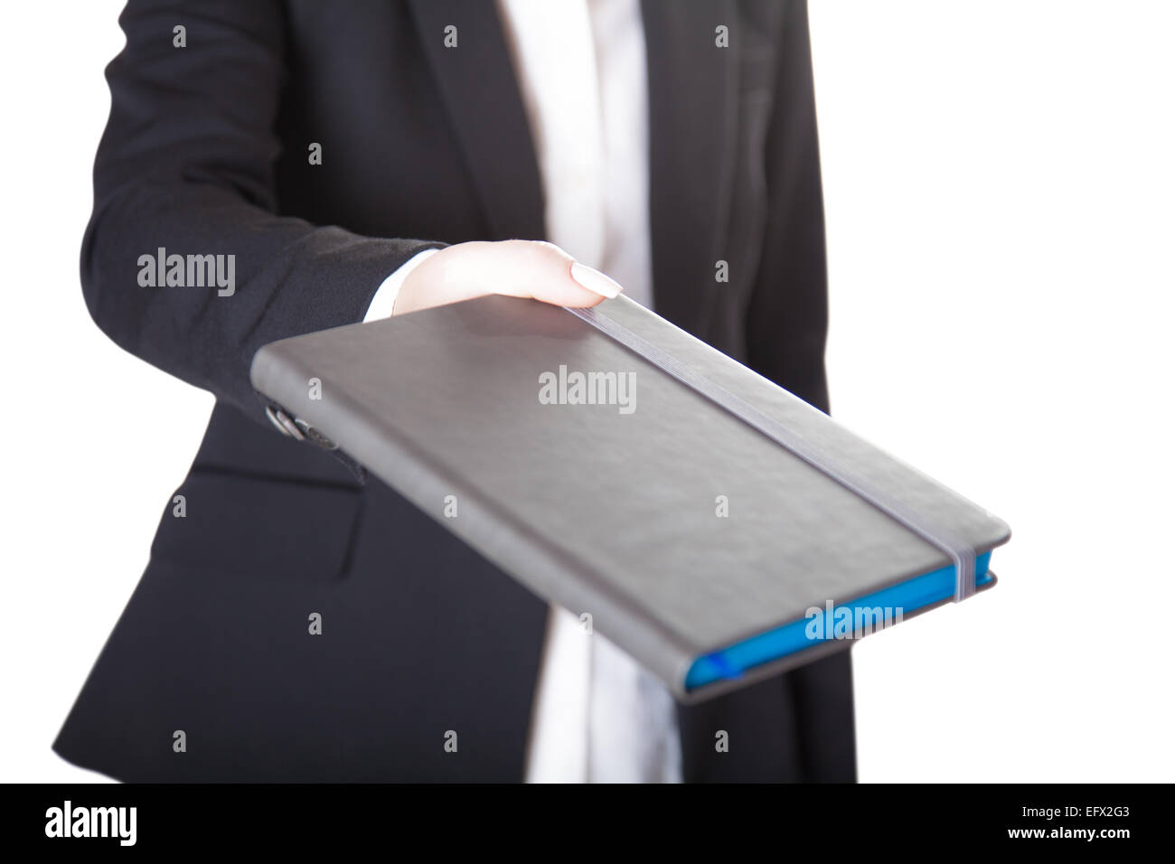 girl gives a notebook, isolated white background Stock Photo - Alamy
