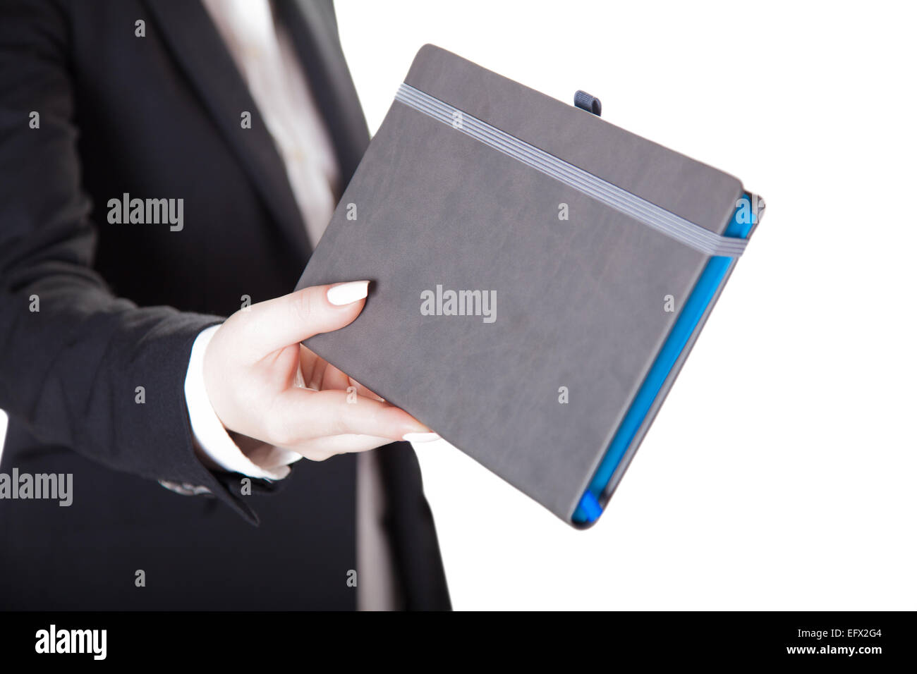 girl gives a notebook, isolated white background Stock Photo - Alamy