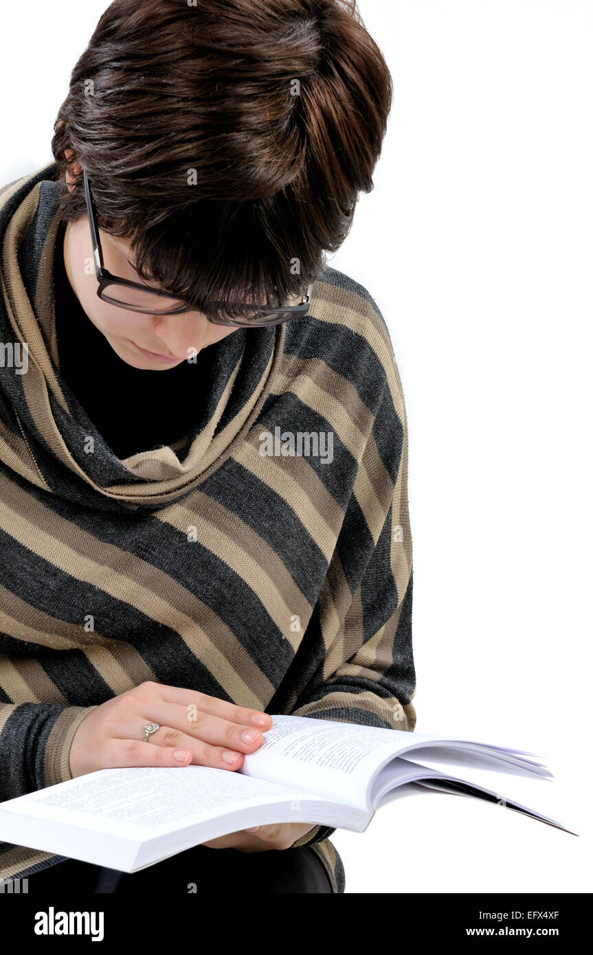 Student reading a book, photographed on white background Stock Photo ...