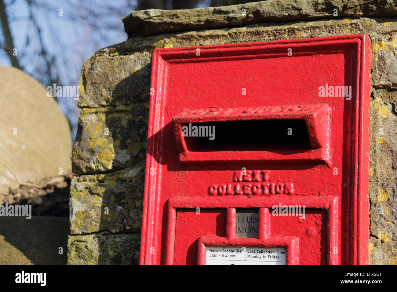 British wall embedded red post box Stock Photo - Alamy