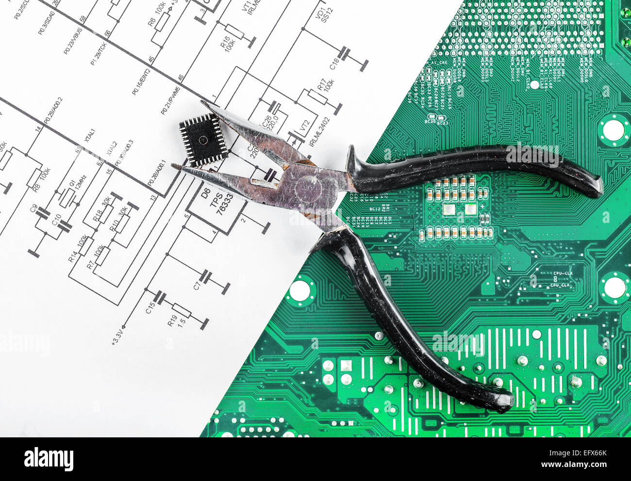 nippers closeup clamped chip lying on the drawing Stock Photo - Alamy