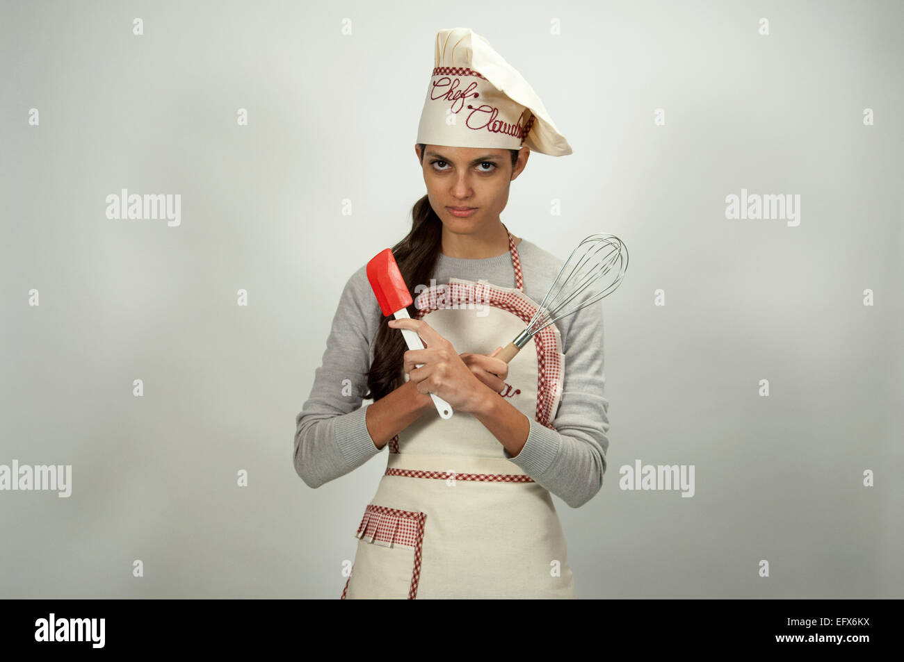 Portrait of a female chef processing food Stock Photo - Alamy