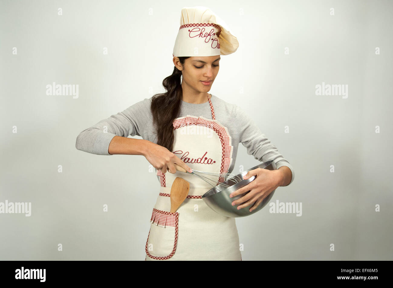 Portrait of a female chef processing food Stock Photo - Alamy