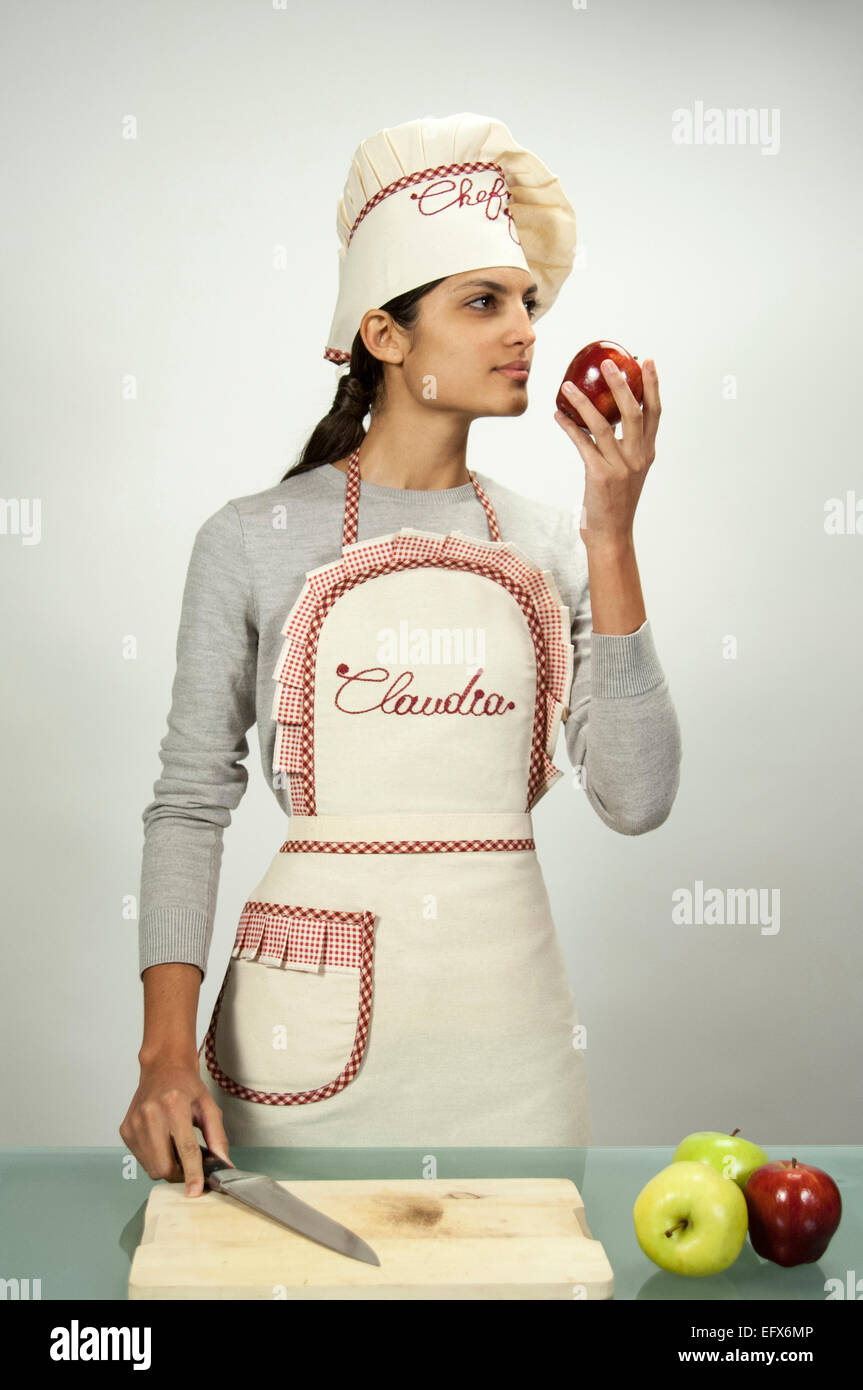 Portrait of a female chef processing food Stock Photo - Alamy