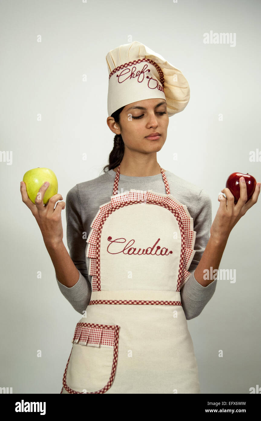 Portrait of a female chef processing food Stock Photo - Alamy