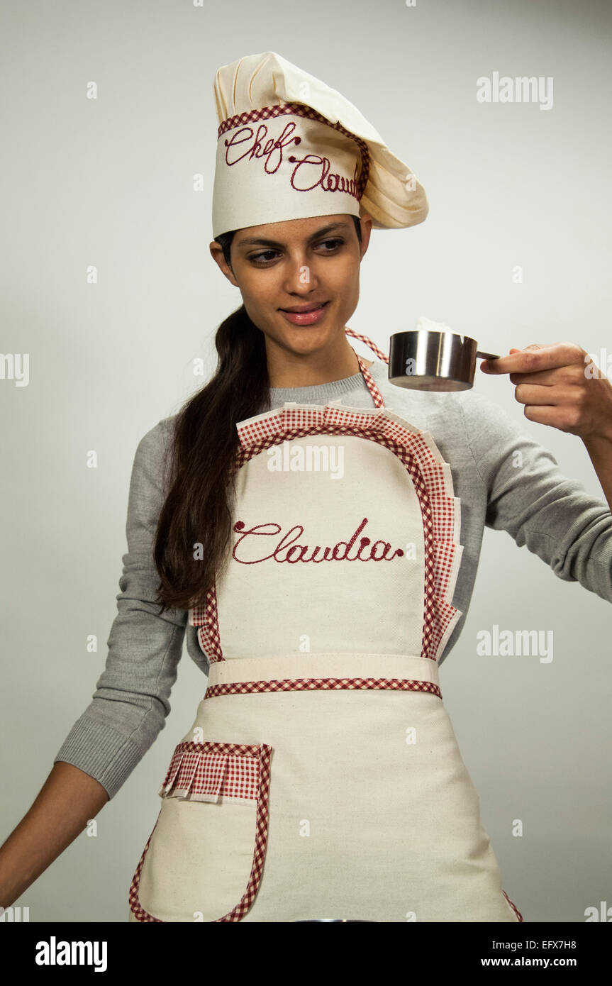 Portrait of a female chef processing food Stock Photo - Alamy