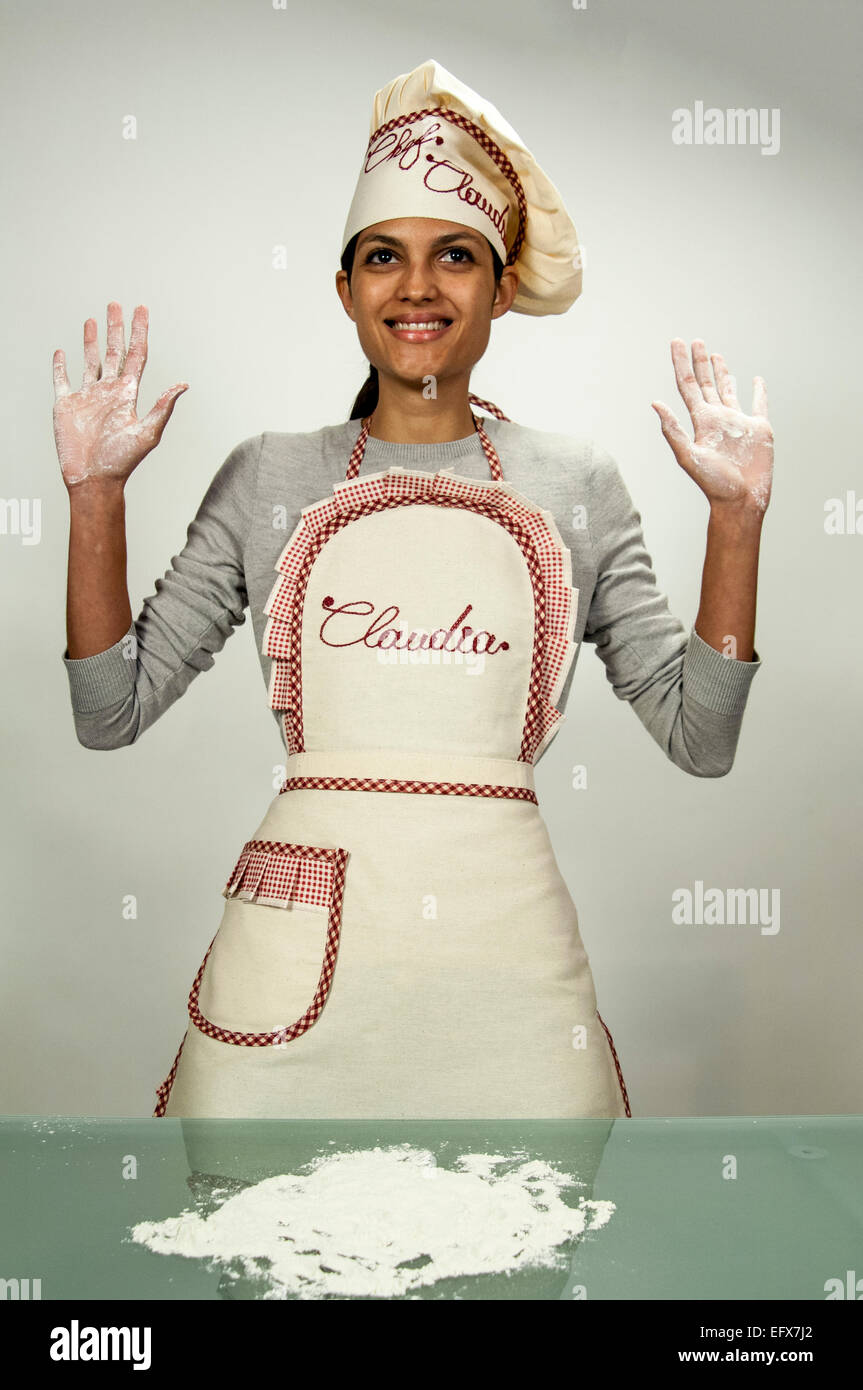 Portrait of a female chef processing food Stock Photo - Alamy