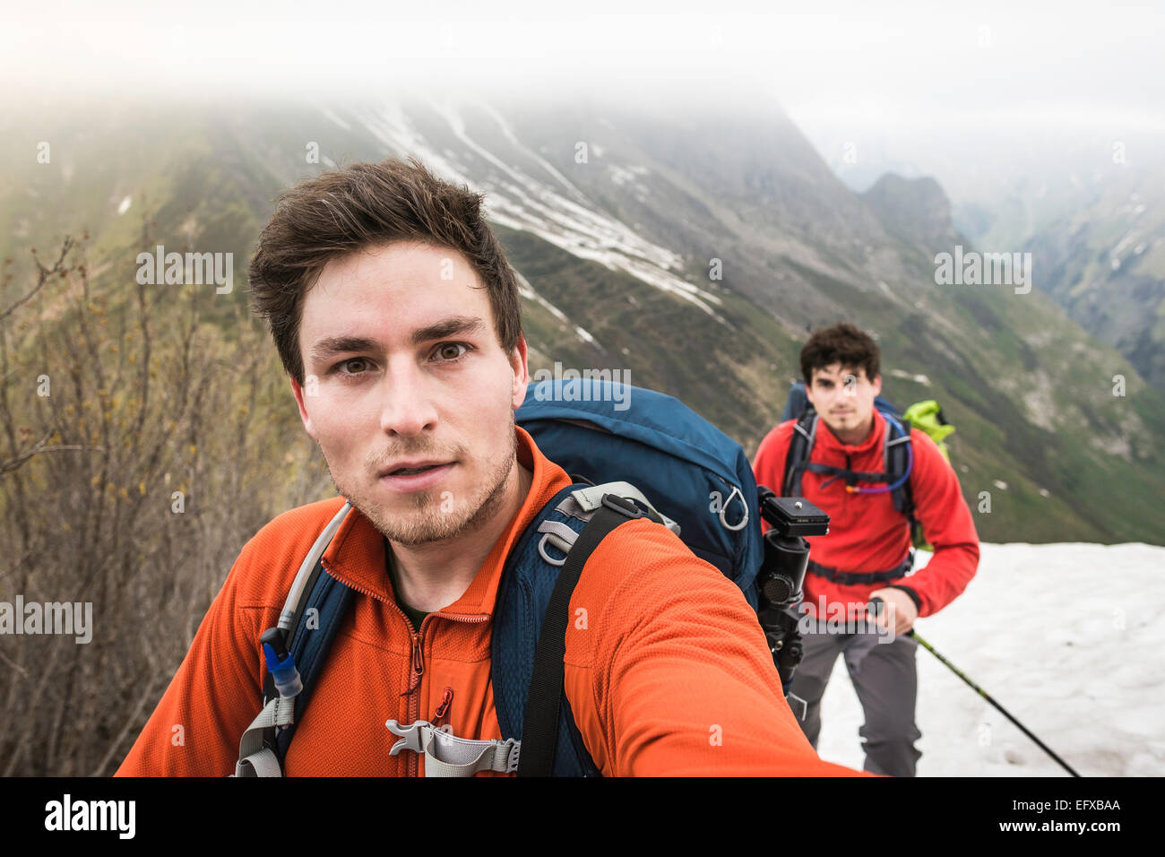 Self portrait of two brothers mountain trekking, Bavarian Alps ...