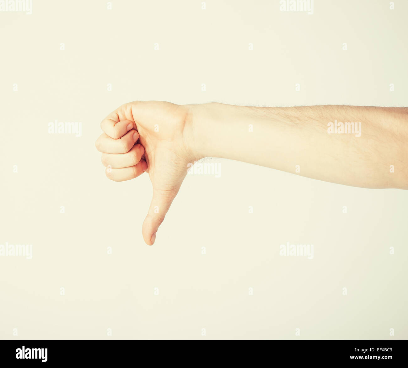 man showing thumbs down Stock Photo - Alamy