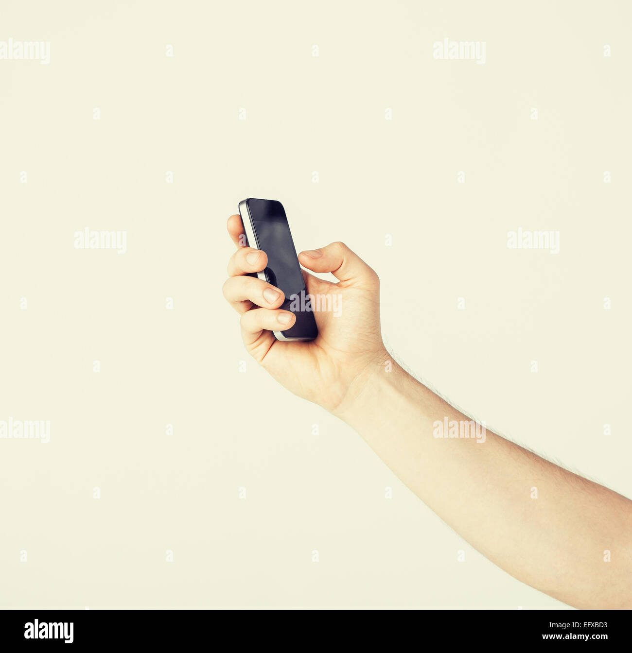 man with smartphone typing something Stock Photo - Alamy